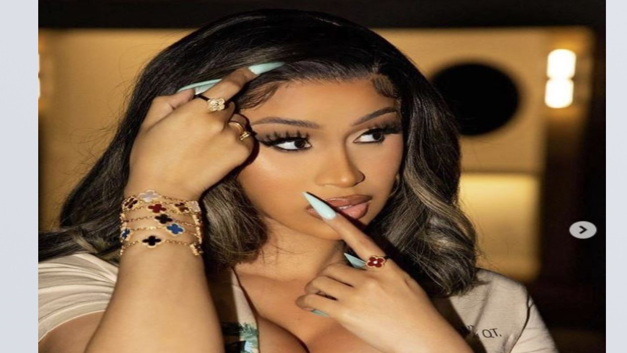 Celebrity Rapper Cardi B Wears All-White Figure-Hugging Dress, and ...