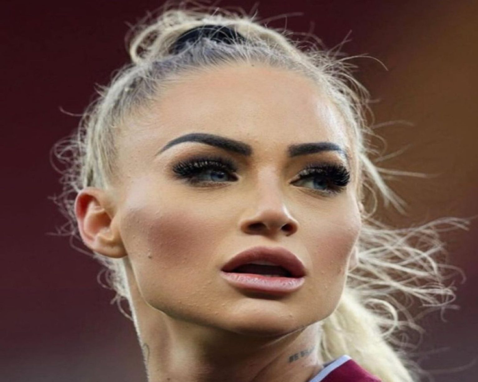 Celebrity Soccer Star Alisha Lehmann Poses on Pitch in Swiss Women's Euro 2022 Squad Uniform - CWEB