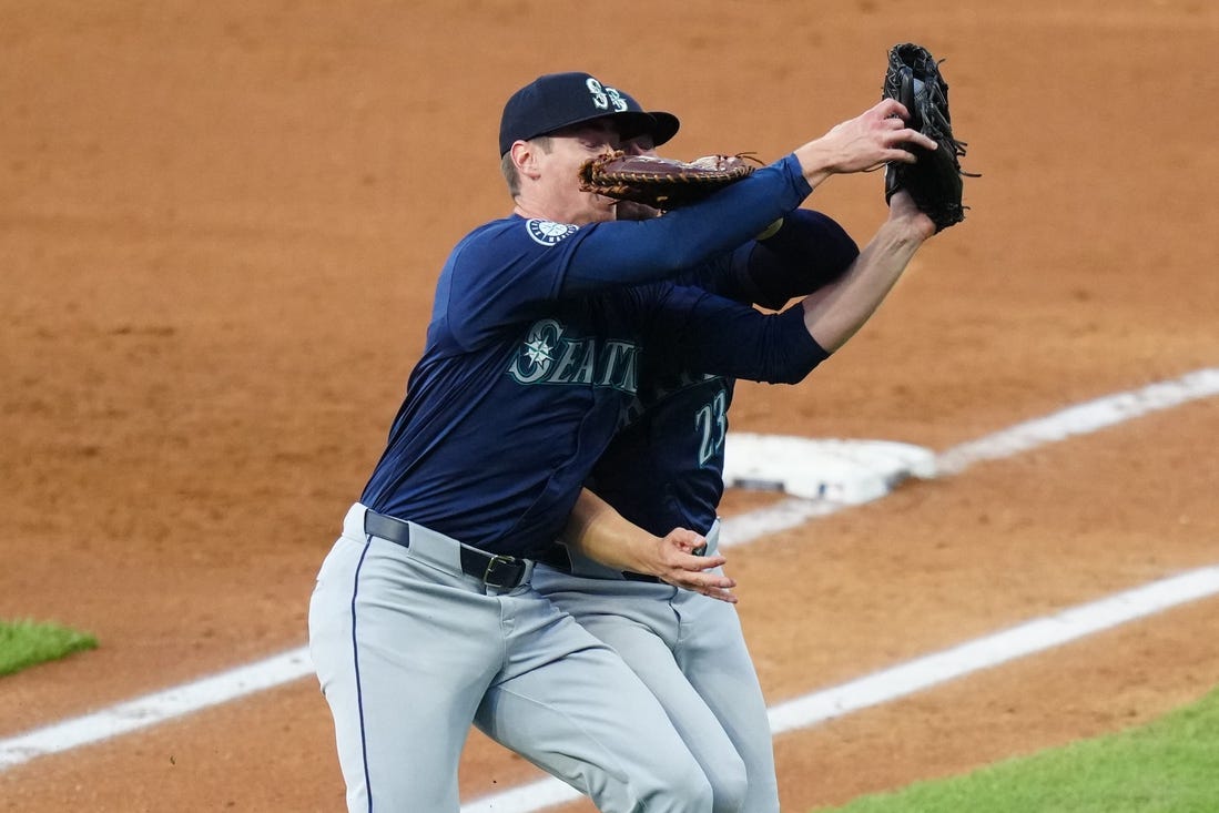 MLB News: Mariners bully Rockies, earn split of twin bill - CWEB